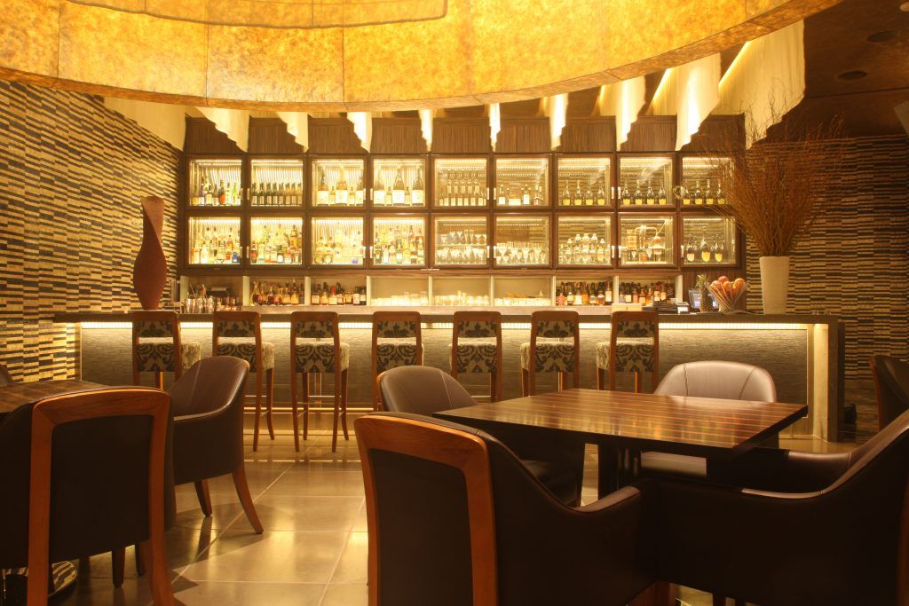 Wind down: 5 best hotel bar happy hours to kickstart your weekend ...