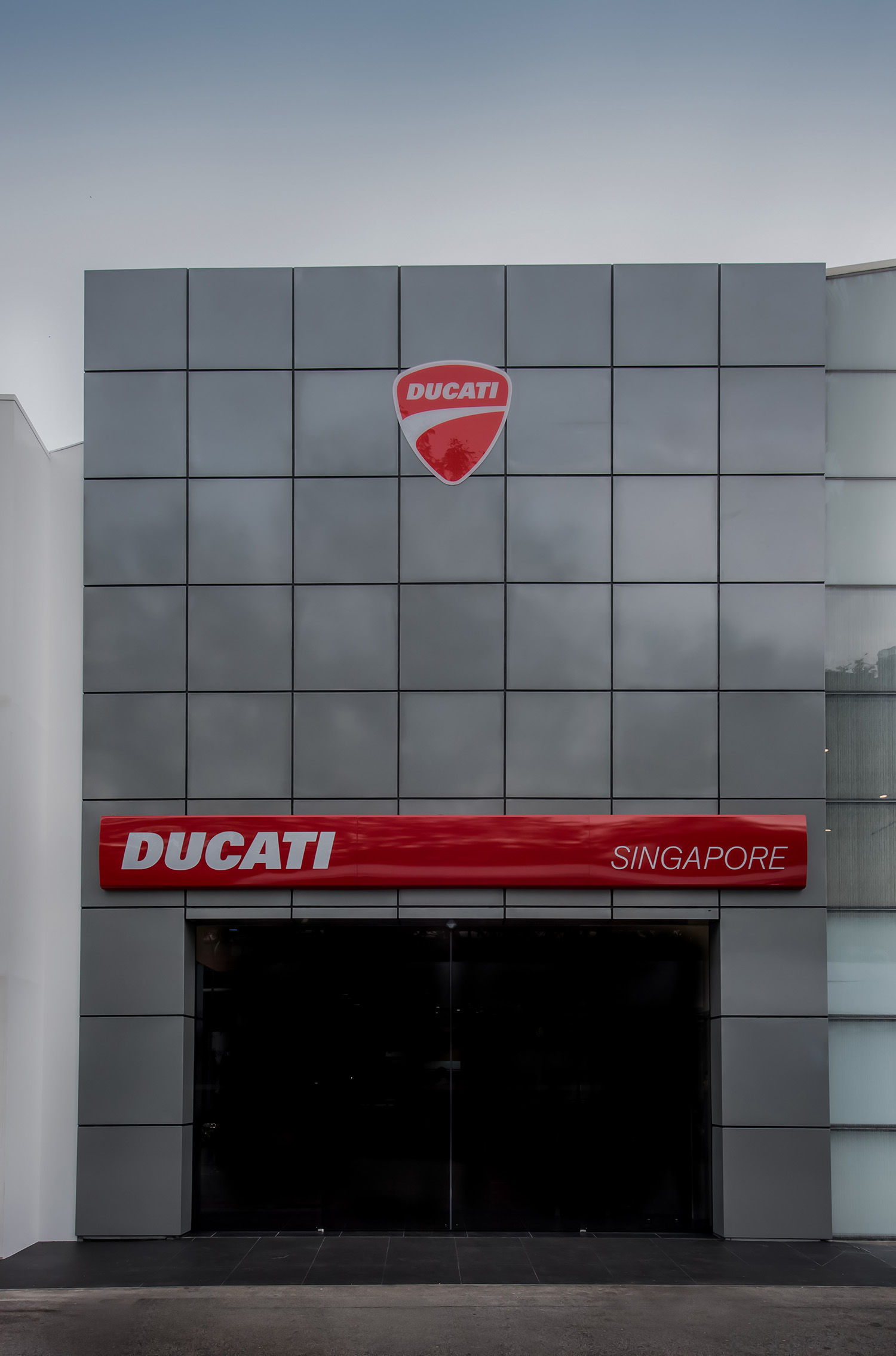 Ducati finally unveils flagship showroom and workshop in Singapore ...