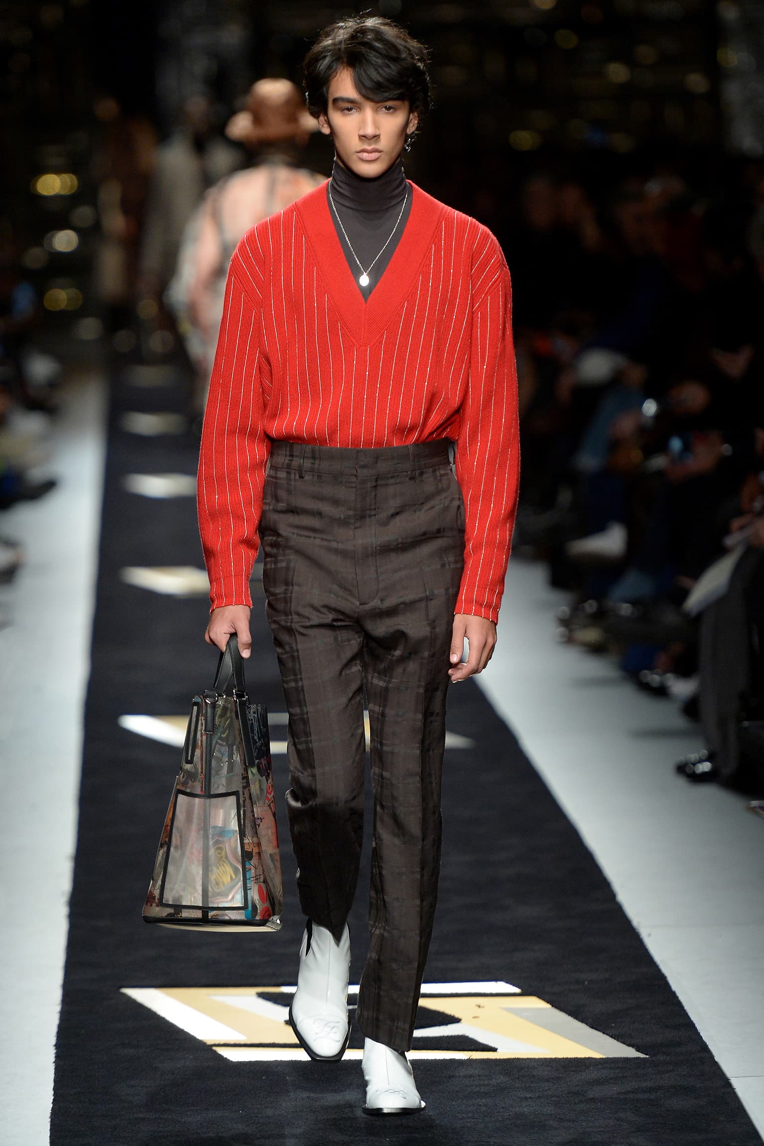 Karl Lagerfeld's designs Fendi's first menswear collection for FW19