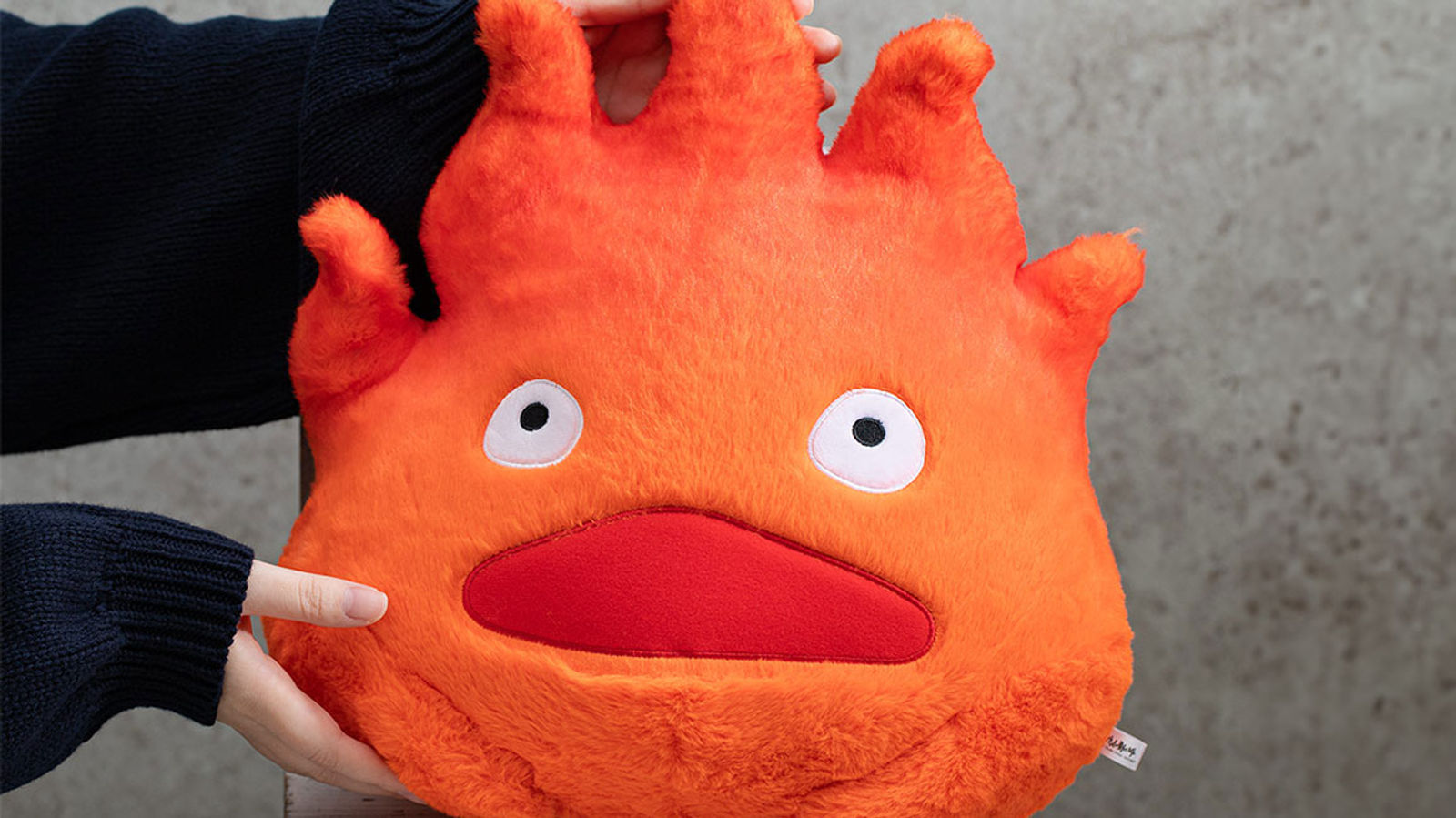Let this Jumbo Calcifer Cushion Keep You Warm this Winter