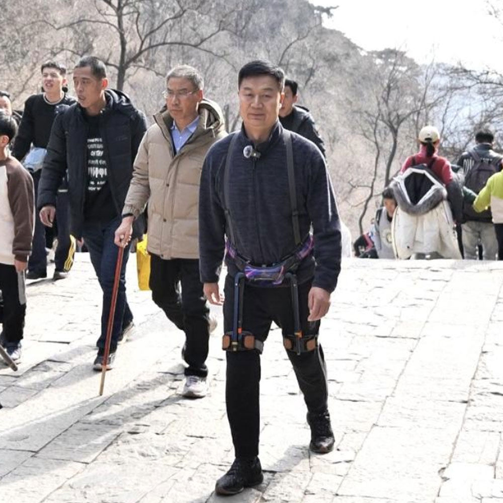 Robotic Exoskeletons aid tourists on challenging Mount Tai hike