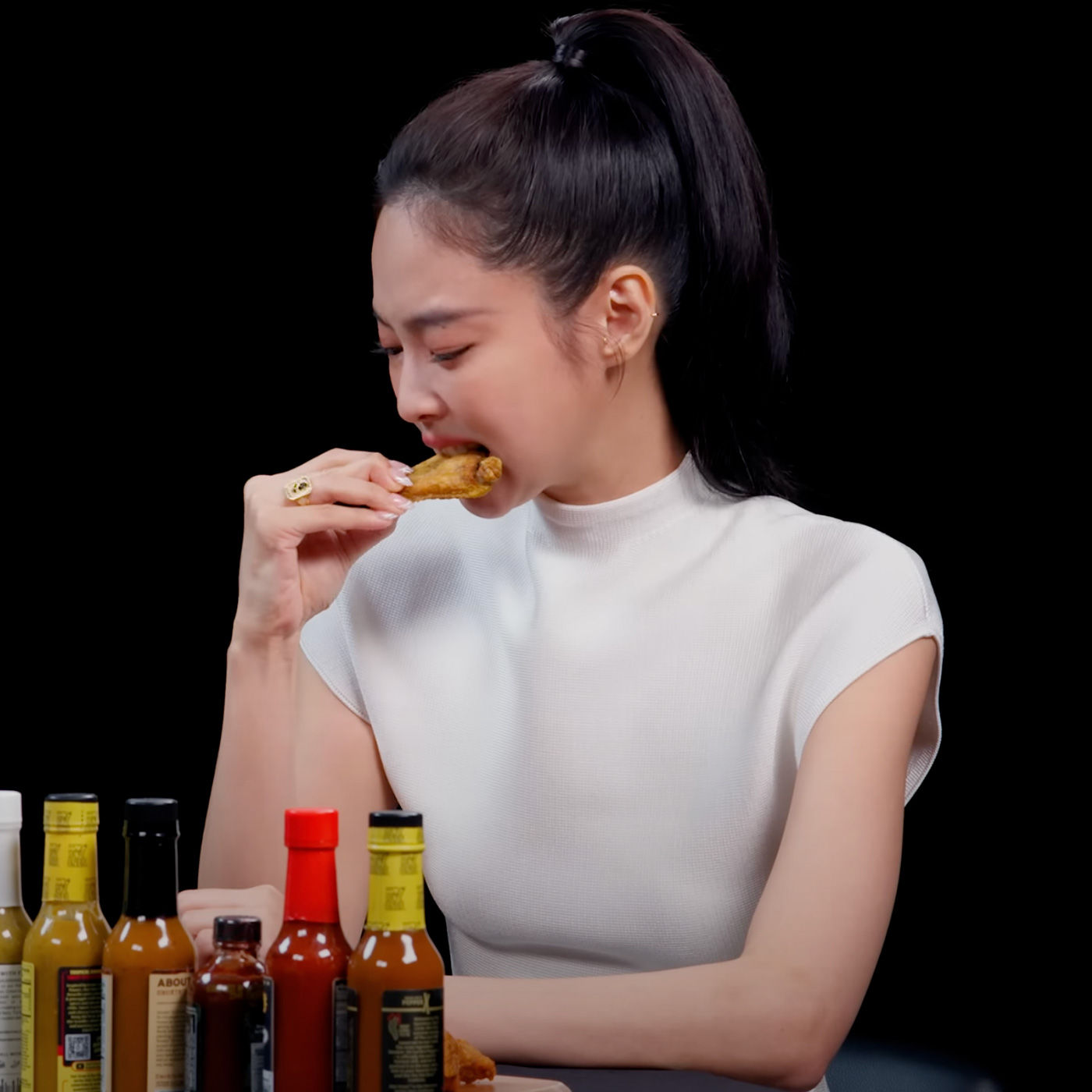 Watch JENNIE Cry in Pain Eating Spicy Wings on 'Hot Ones'