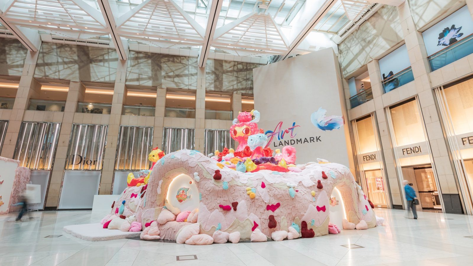Behind 'THE ISLAND — ONIGASHIMA' by Ayako Rokkaku at LANDMARK