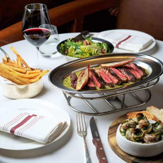 An itinerary for John Cleese in Bangkok, based on his best roles