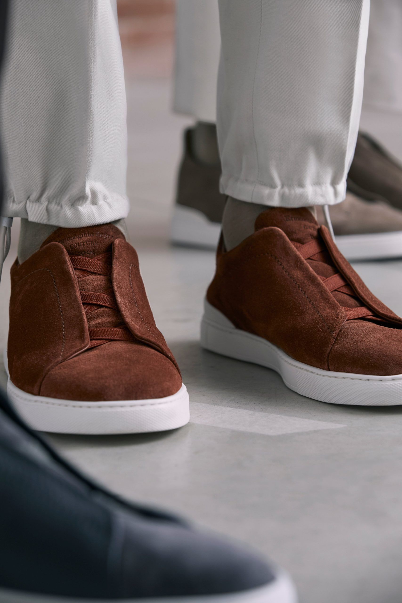 Ermenegildo Zegna’s Triple Stitch sneakers are this season’s must-have