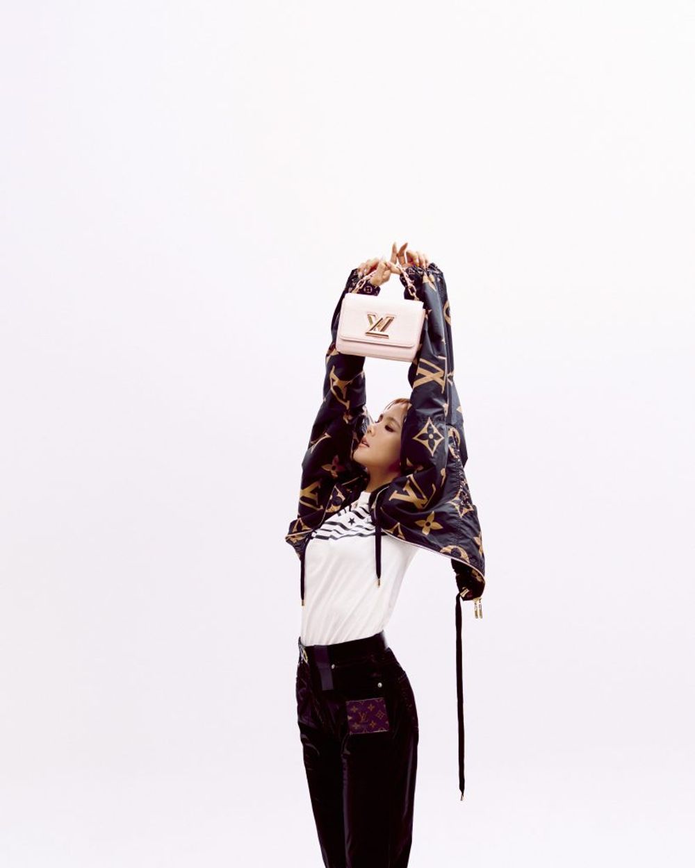 Michiyo Ho and Shusen Wong get stylishly cosy with the LV Twist bags