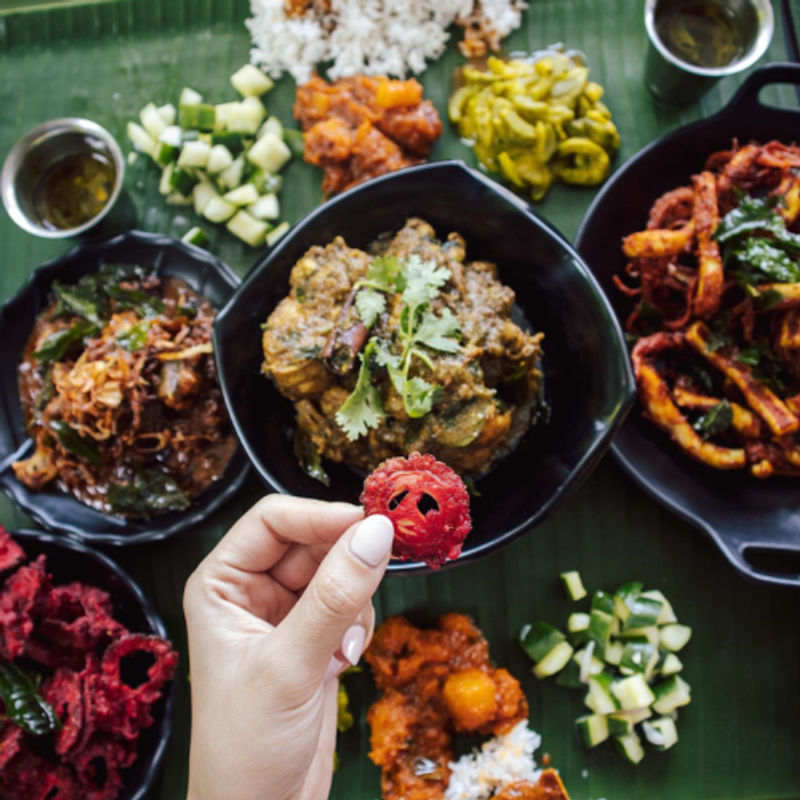 What is a blue banana and why does it exhibit such an intriguing colour?