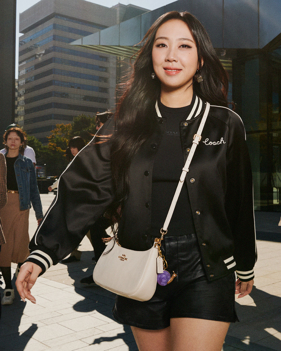 Elle Fanning, Kōki, Nazha and Youngji Lee star in the Coach Spring 2025 ...