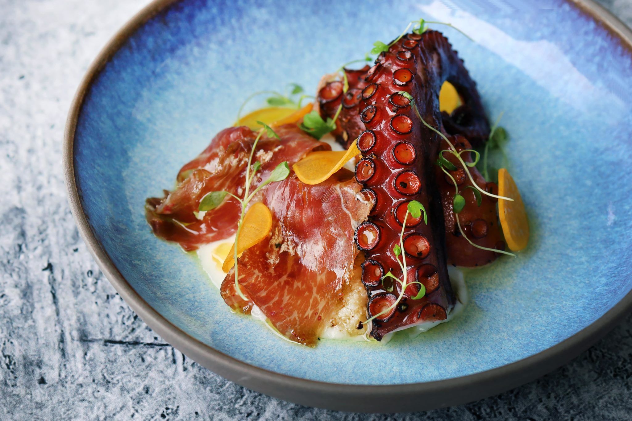 Get the best of the land and sea at Bedrock Origin and Fat Cow