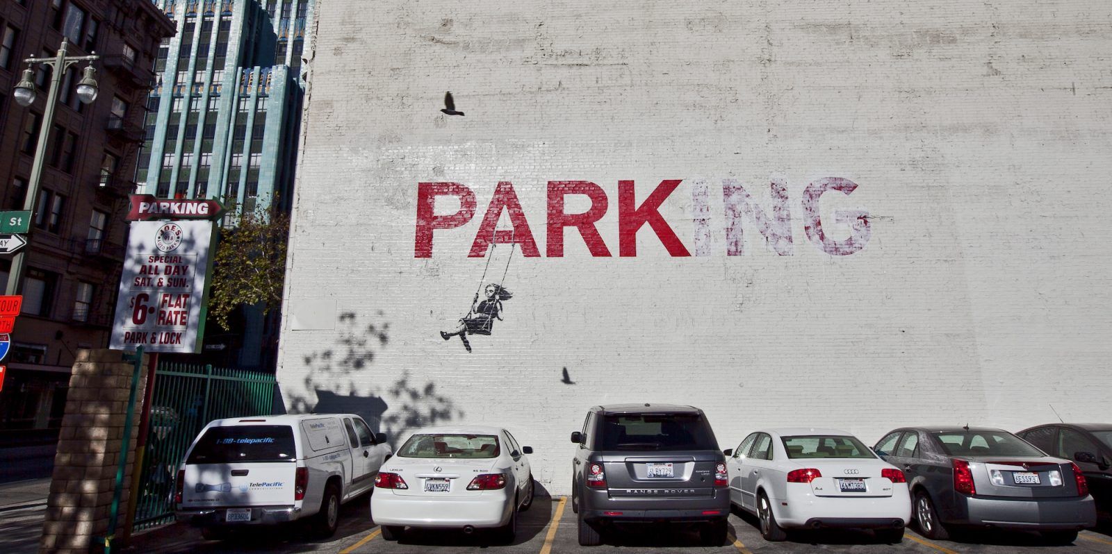 Los Angeles building with Banksy’s ‘Girl on a Swing’ mural is up for ...