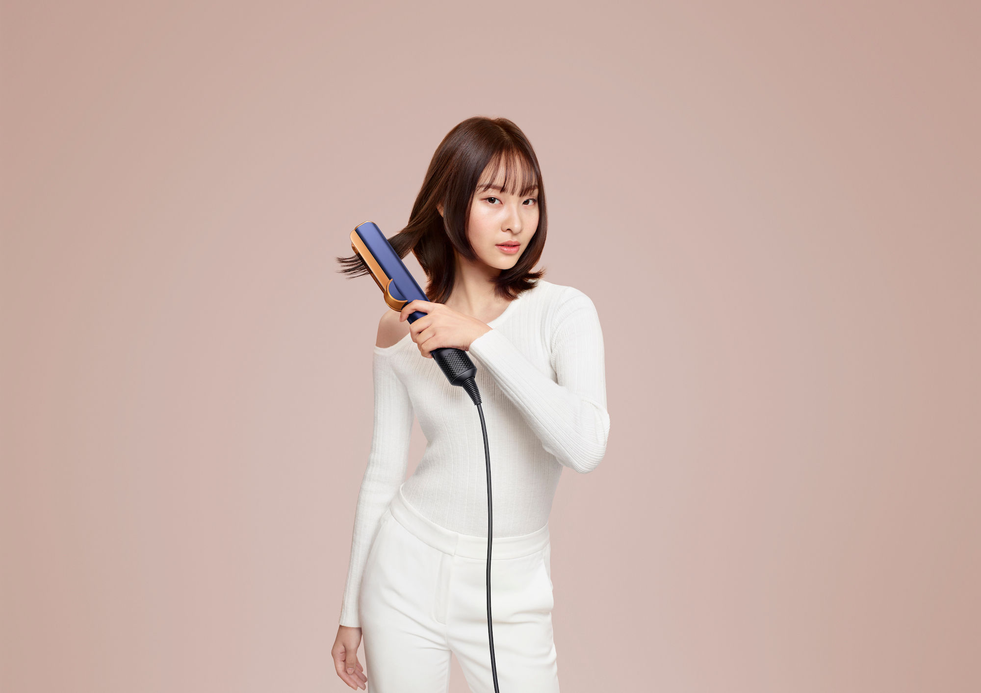 The new Dyson Airstrait promises naturally straight hair without damage