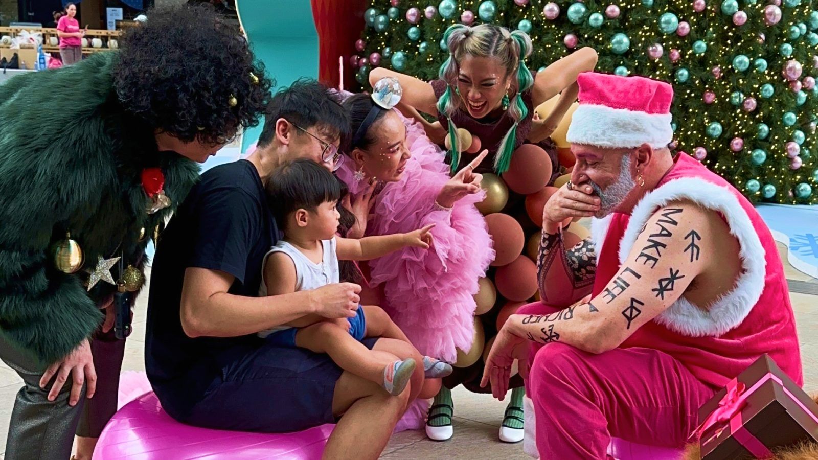 Chocolate Finance's Pink Santa is on a Christmas mission to spread joy ...