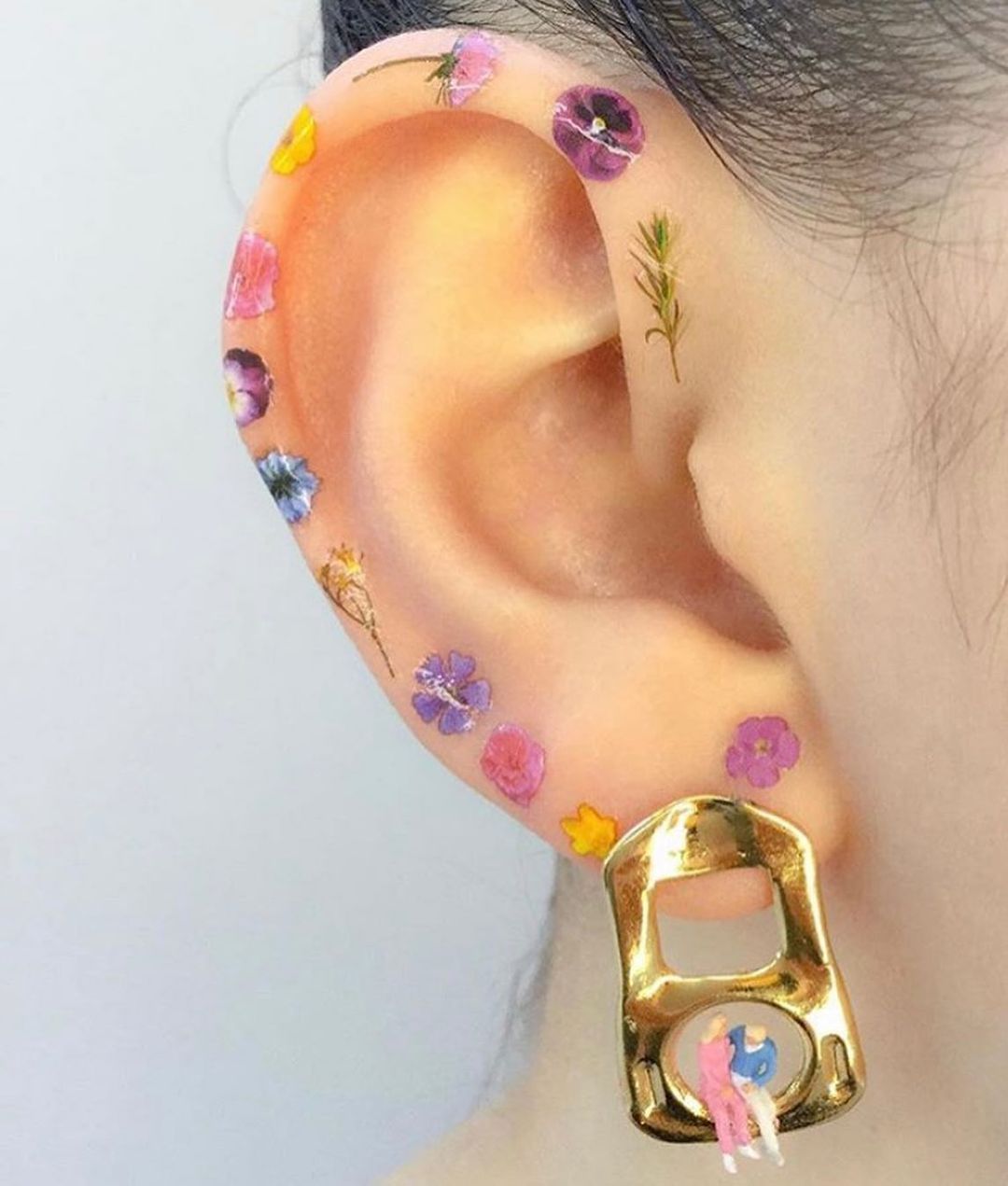 Ear makeup is one big beauty trend in 2021 and we're curious