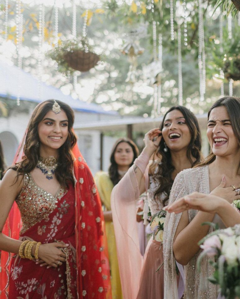 Brides who wore the traditional red wedding outfits in their own unique way