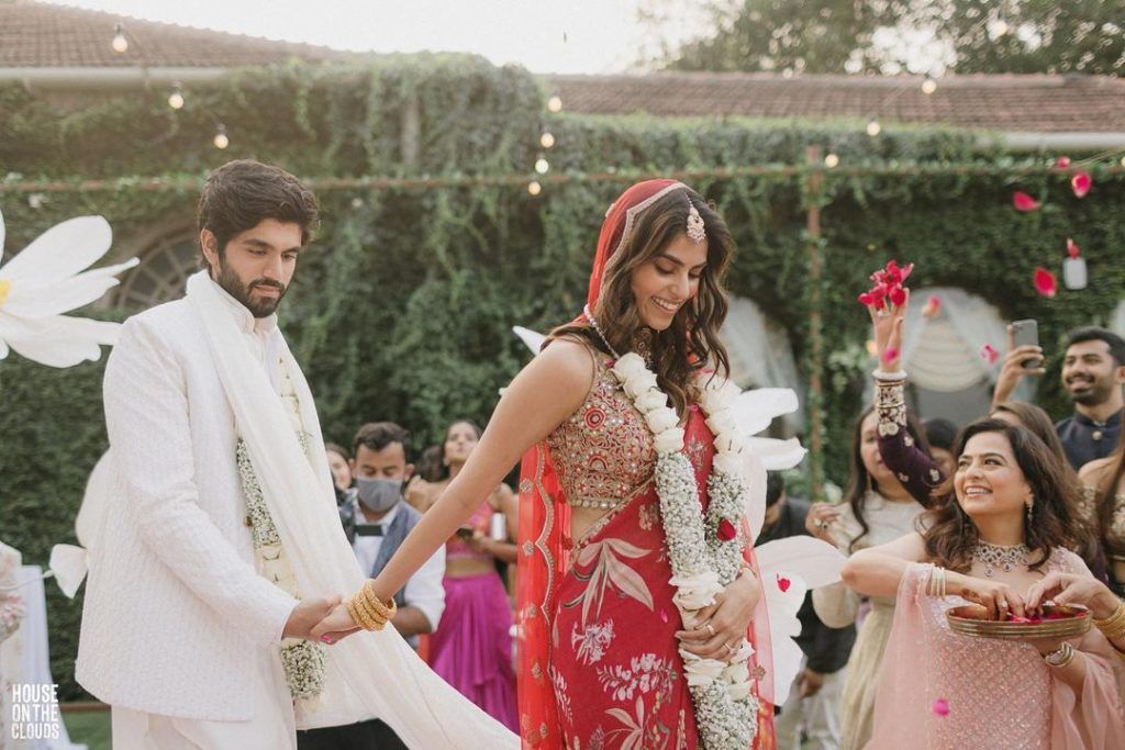 Brides who wore the traditional red wedding outfits in their own unique way