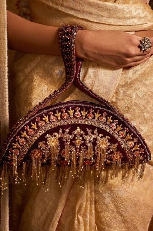 Complete your wedding day look with these bridal purse options